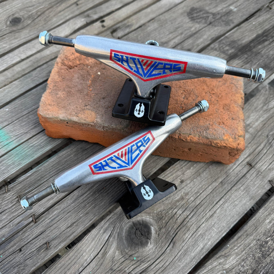 Trucks Shivers Logo Azul Plata Base Negro 147 – Chilango Skate